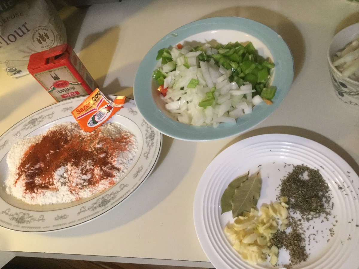 Perfect Spanish Chicken Thighs and Yellow Rice Recipe - Delishably