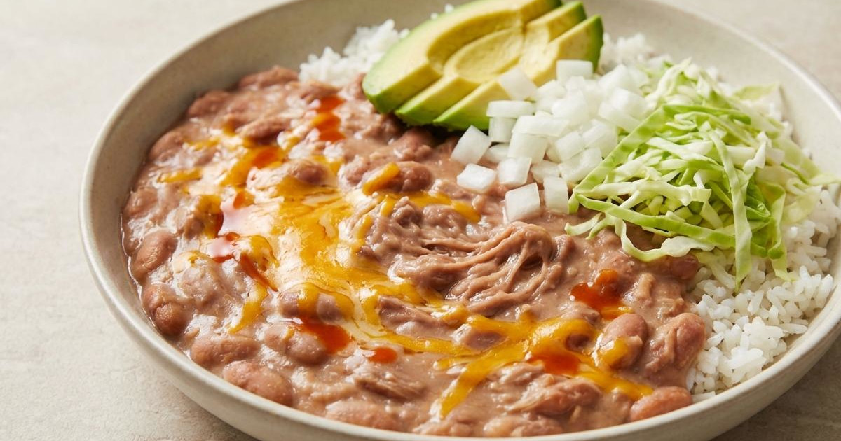 Cheesy Pinto Beans With Rice - Delishably