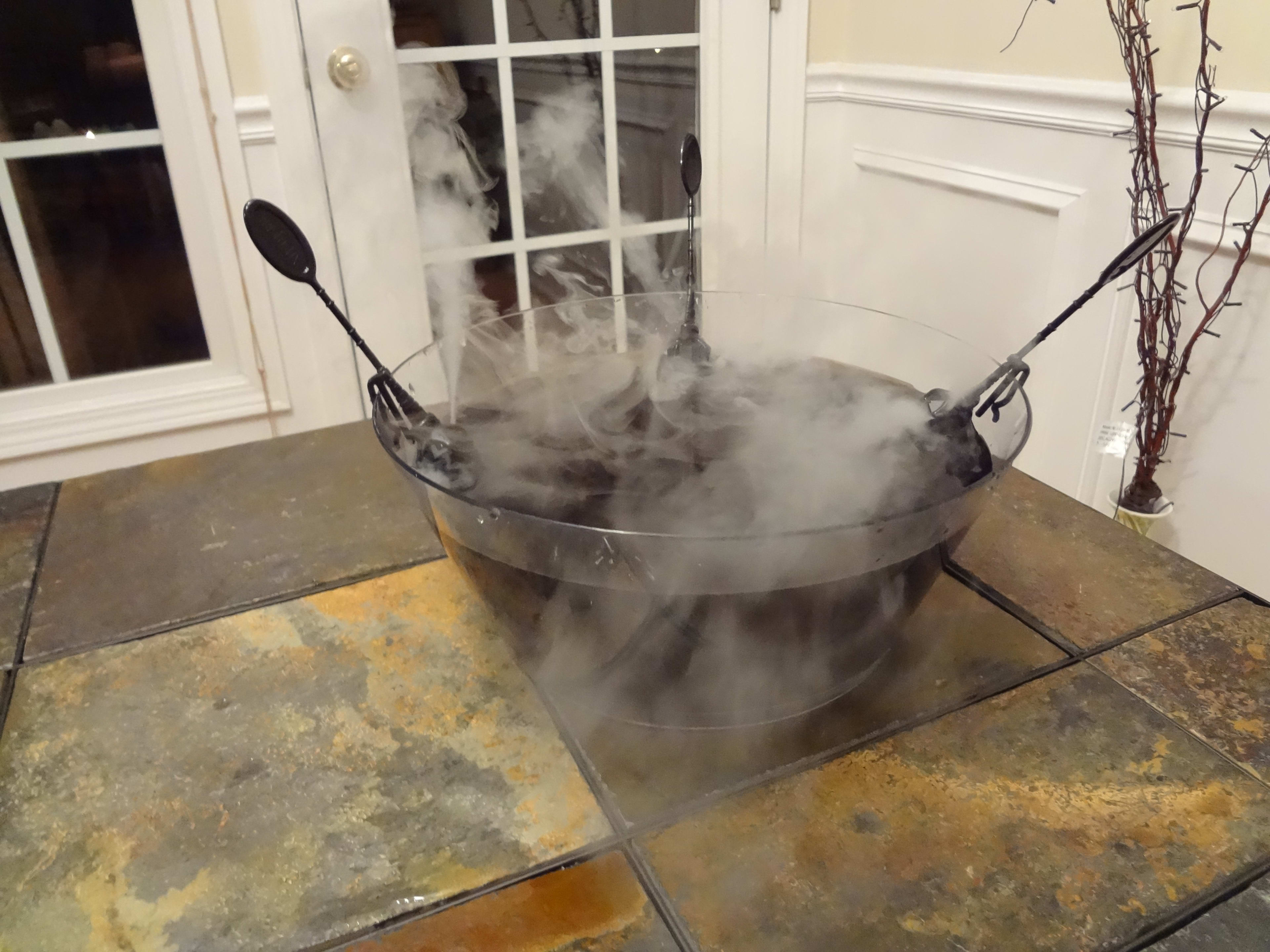Using Dry Ice in Drinks to Make Smoking, Bubbling Libations - Delishably